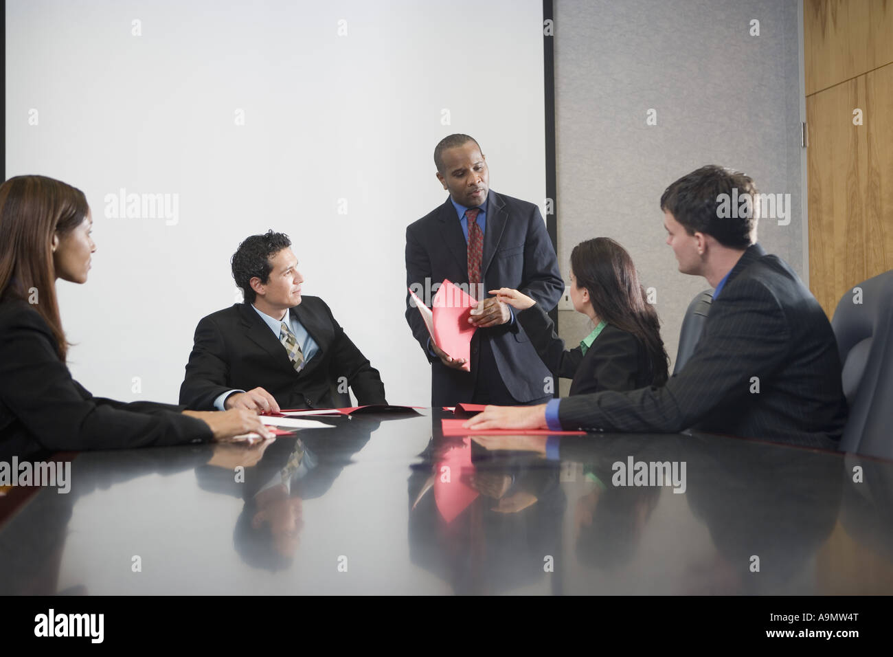 Business executives at a presentation in a formal conference room Stock ...