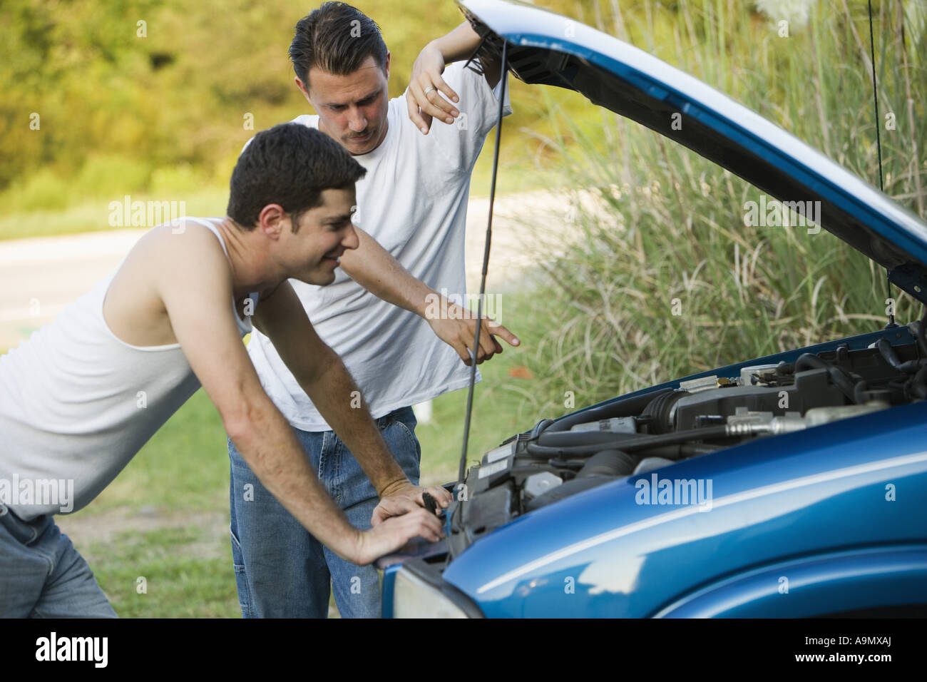 Hood opened fixing car hi-res stock photography and images - Alamy