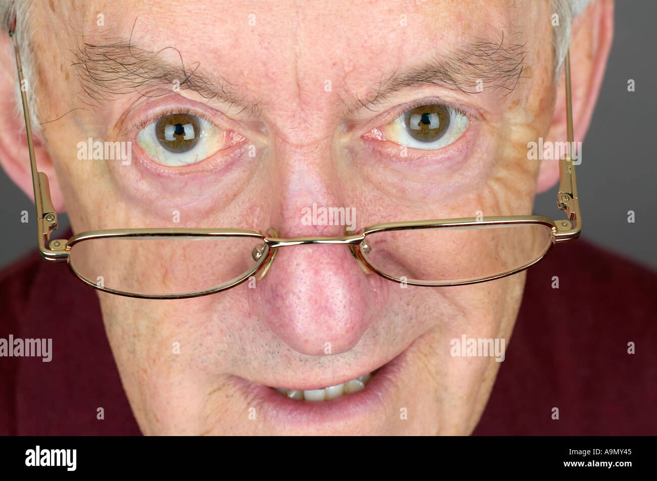 Closeup white man peering over hi-res stock photography and images - Alamy