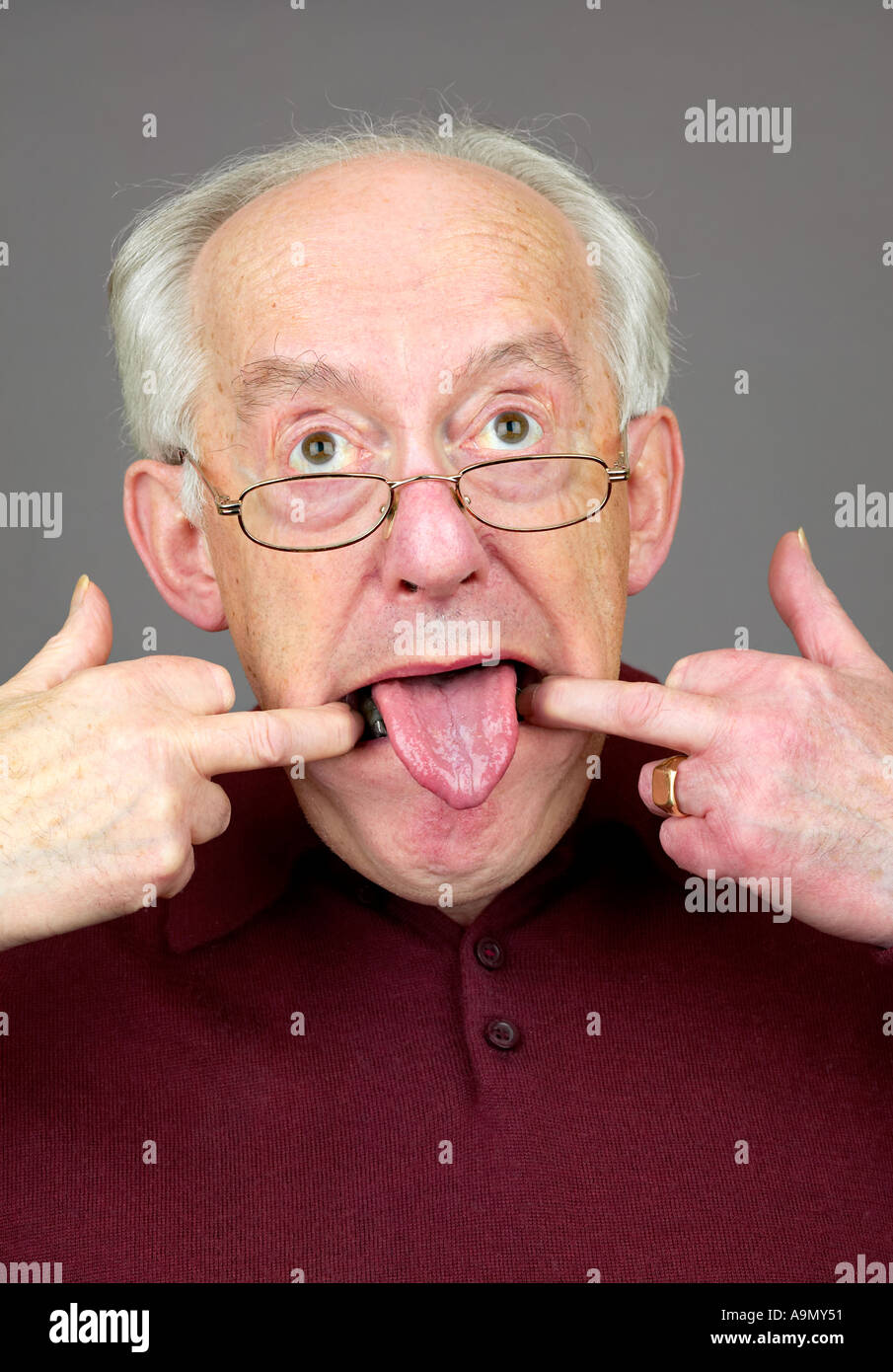 Portrait old man pulling face hi-res stock photography and images - Alamy