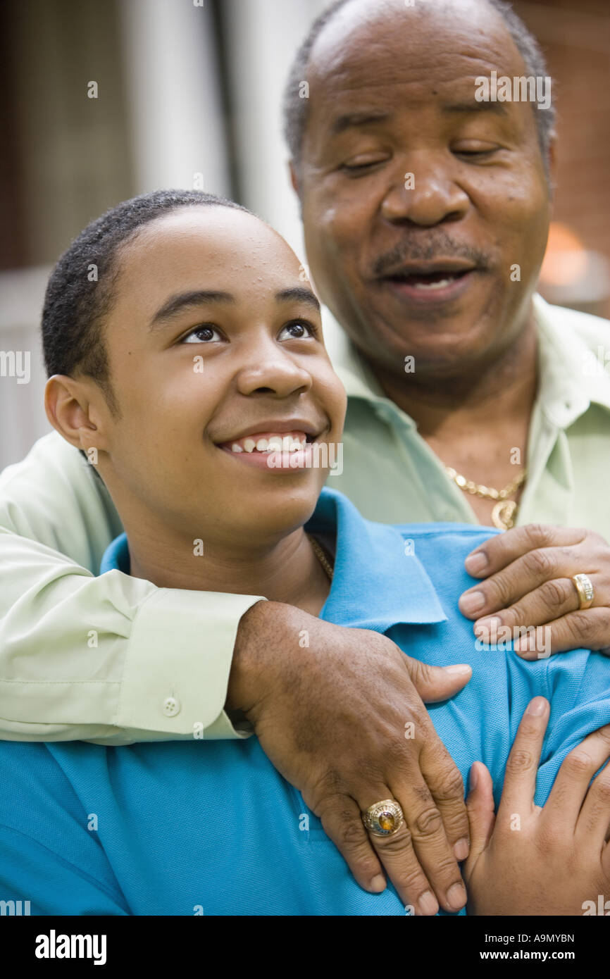 Close-up of a father embracing his son Stock Photo - Alamy