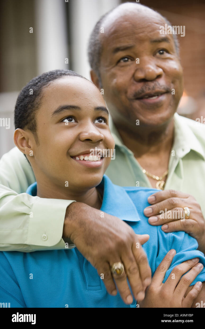 Close-up of a father embracing his son Stock Photo - Alamy