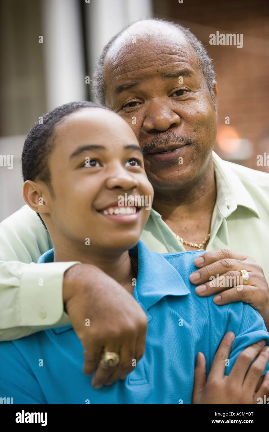 Close-up of a father embracing his son Stock Photo - Alamy
