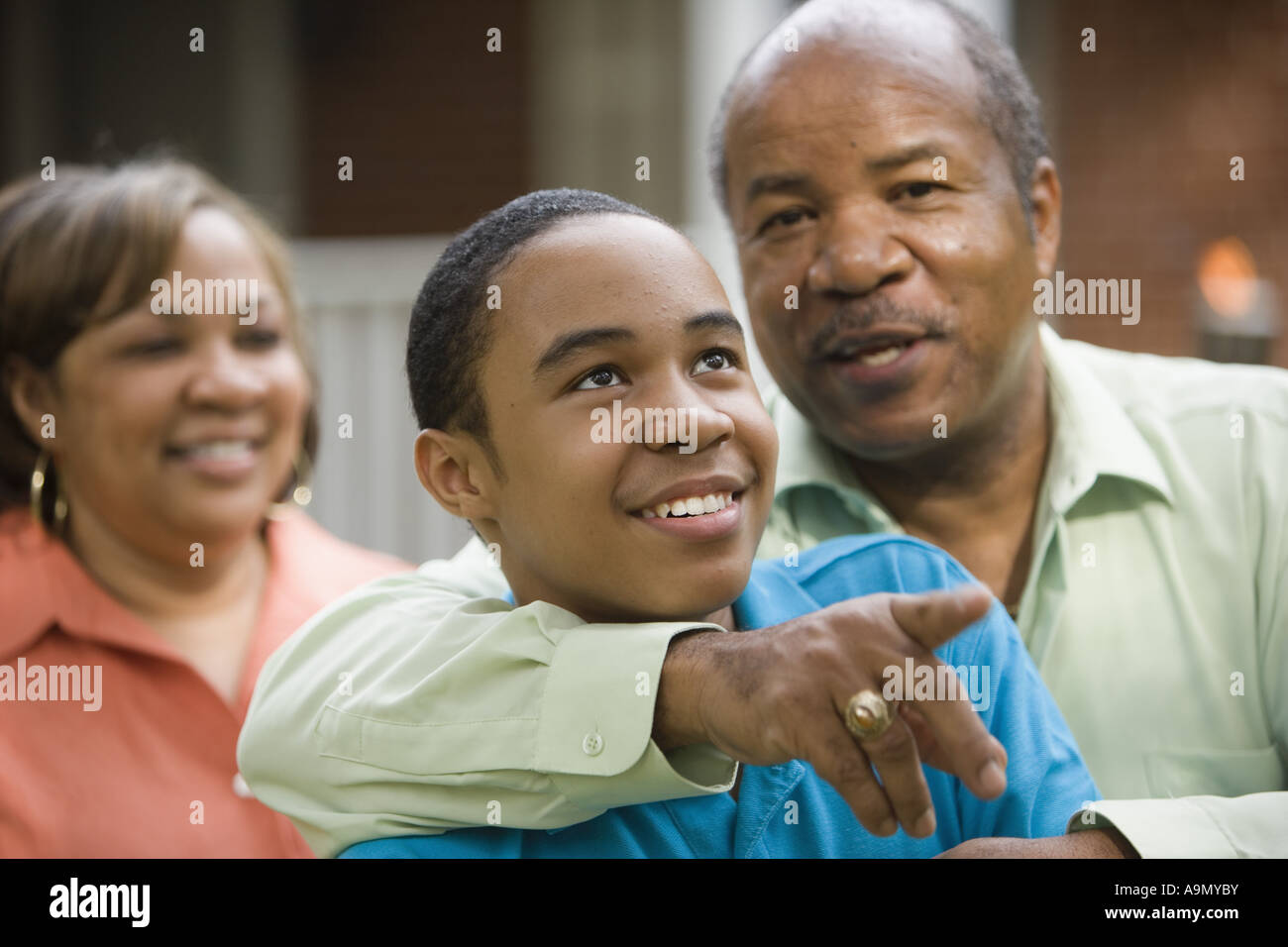 Close up of African American boy with parents Stock Photo - Alamy