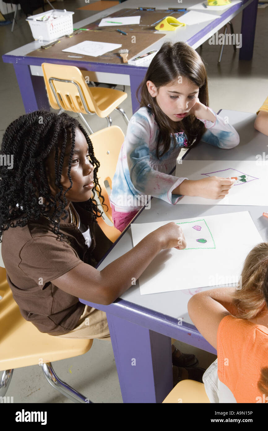 Girls drawing in art class Stock Photo - Alamy