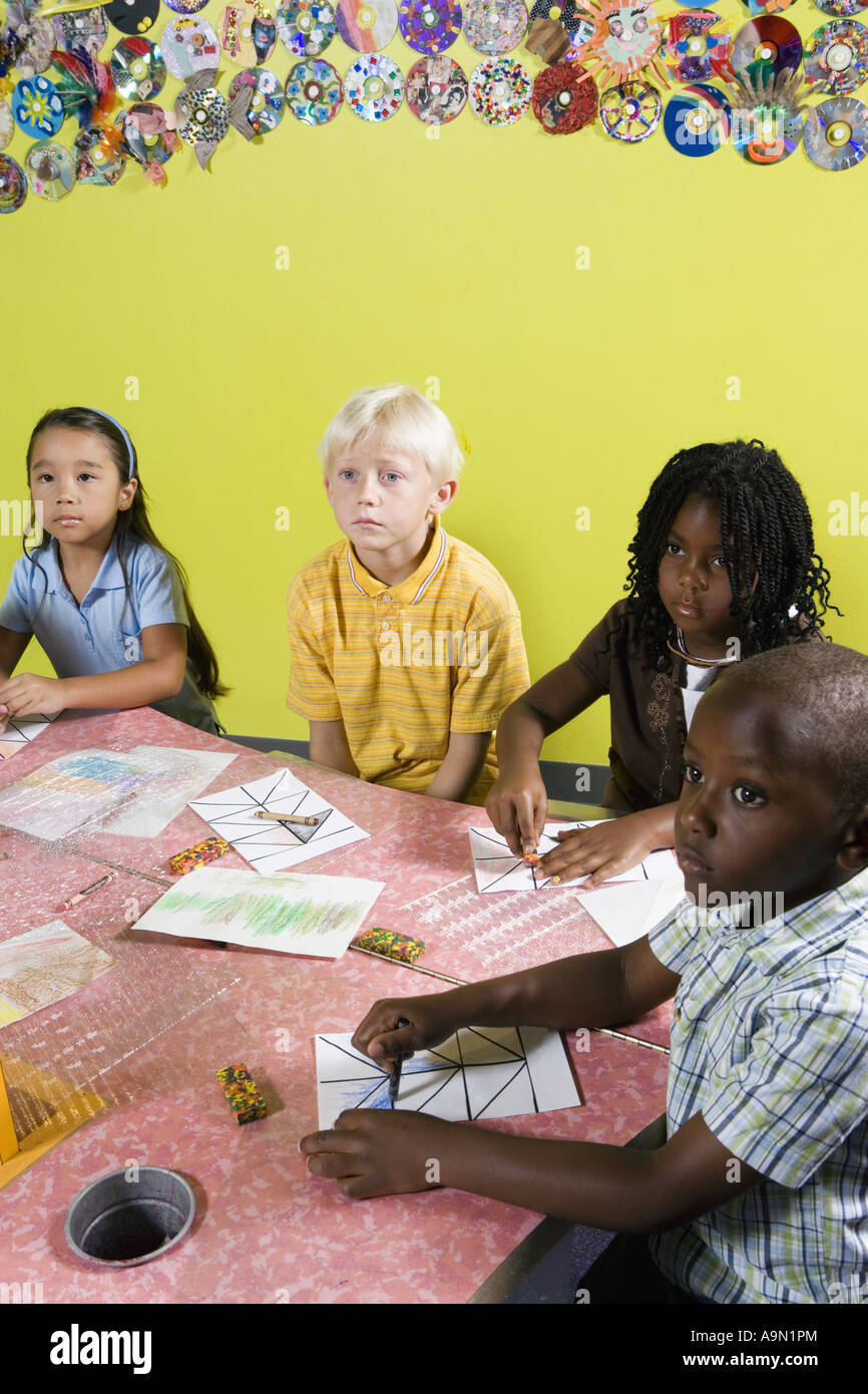 Children drawing and paying attention in class Stock Photo - Alamy