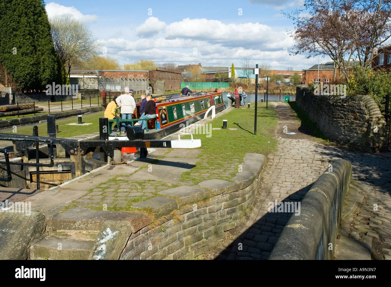Narrowboat at Fairfield Locks on the Ashton Canal at Droylsden ...