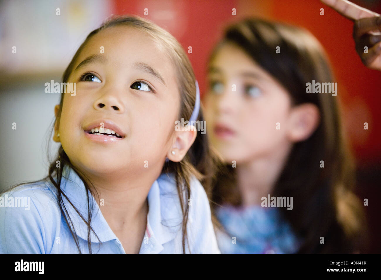 Close up of two little girls side by side Stock Photo - Alamy