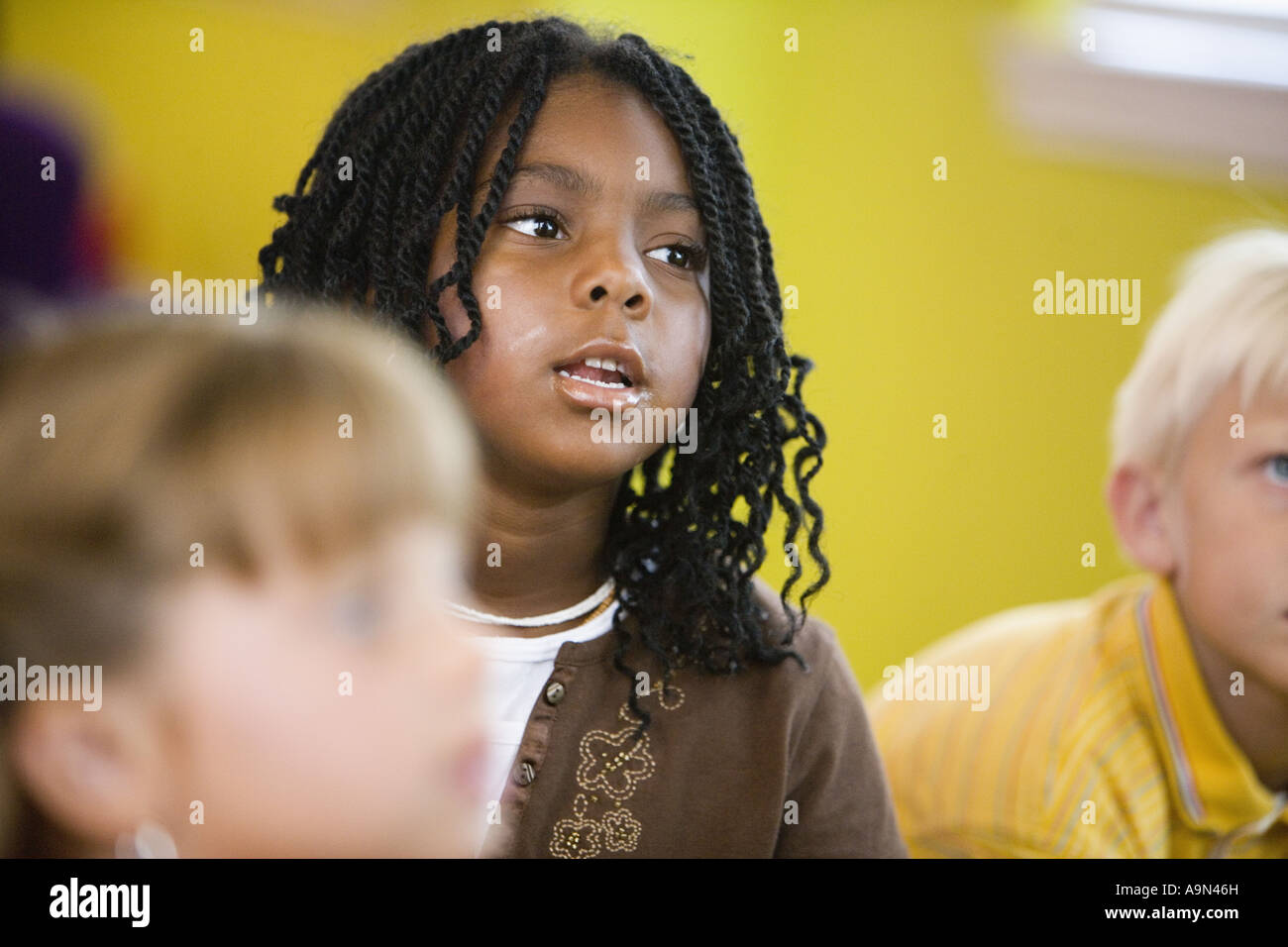 Kids attentive faces hi-res stock photography and images - Alamy