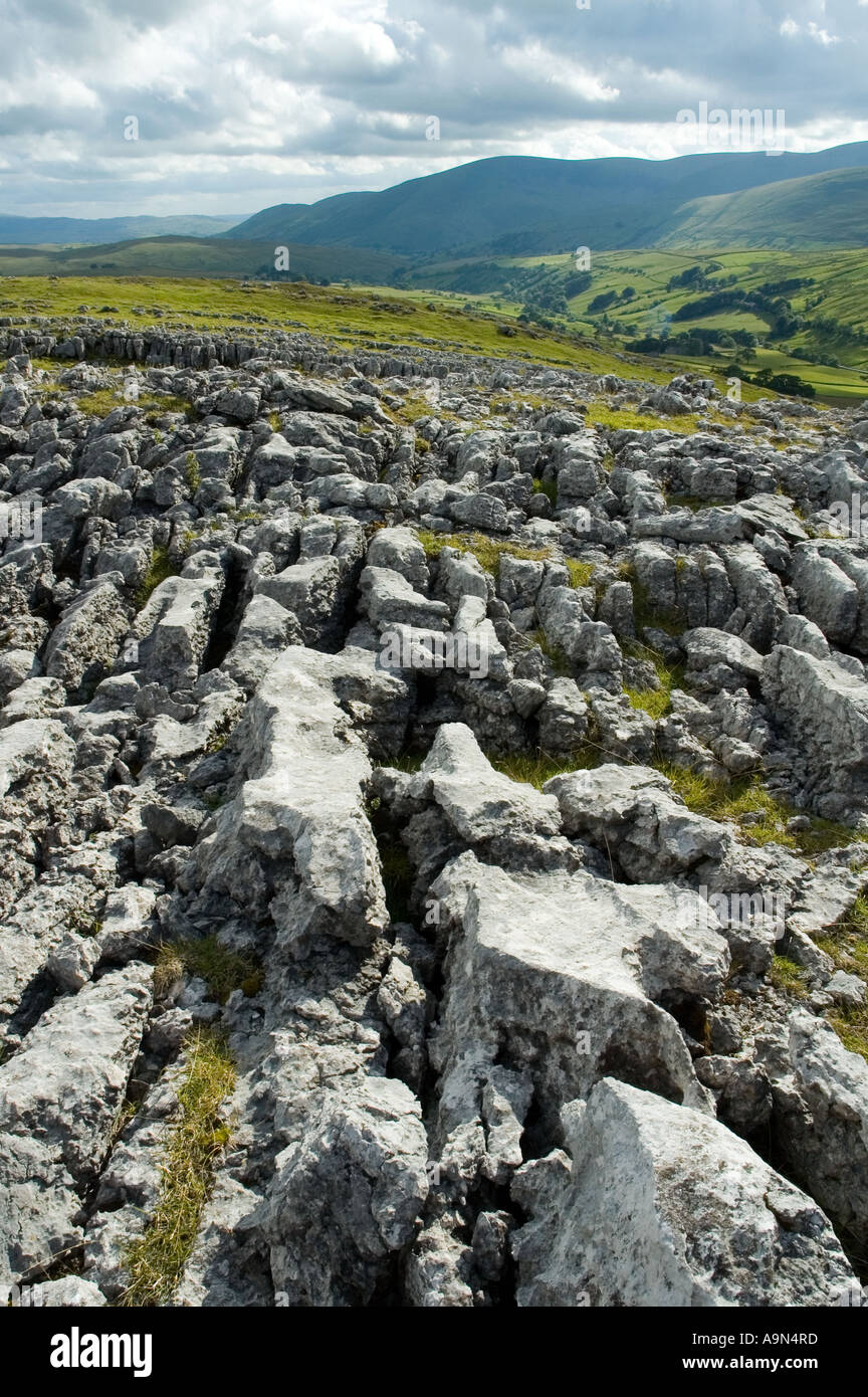 Ravenstonedale from Stennerskeugh Clouds limestone pavement, near ...