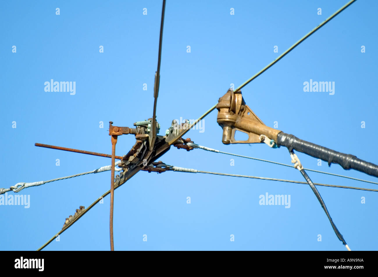 Tram overhead power wires with junction, and tram power take off arm ...