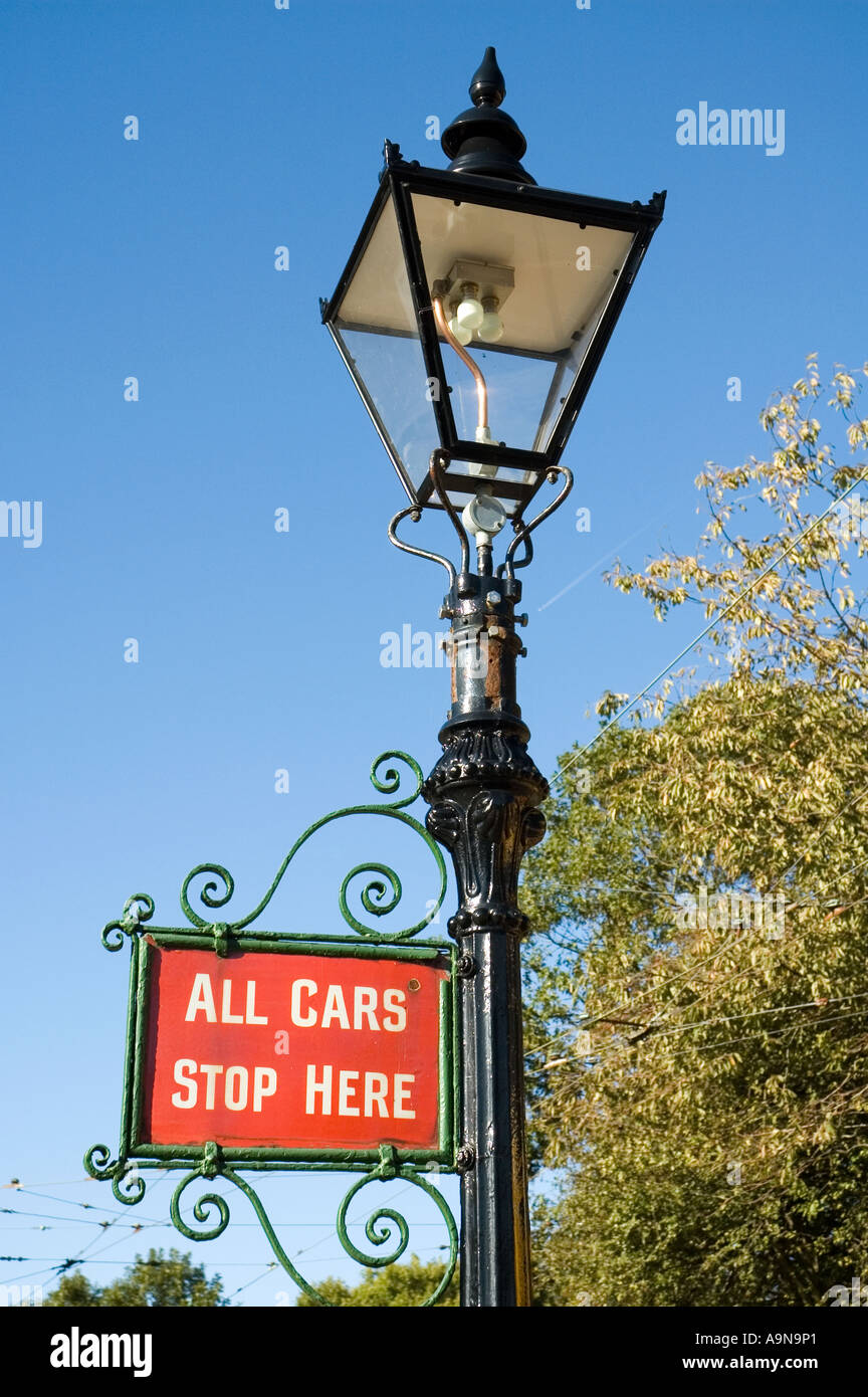 Tram stop sign and Victorian street lamp, at the Crich Tramway Village ...
