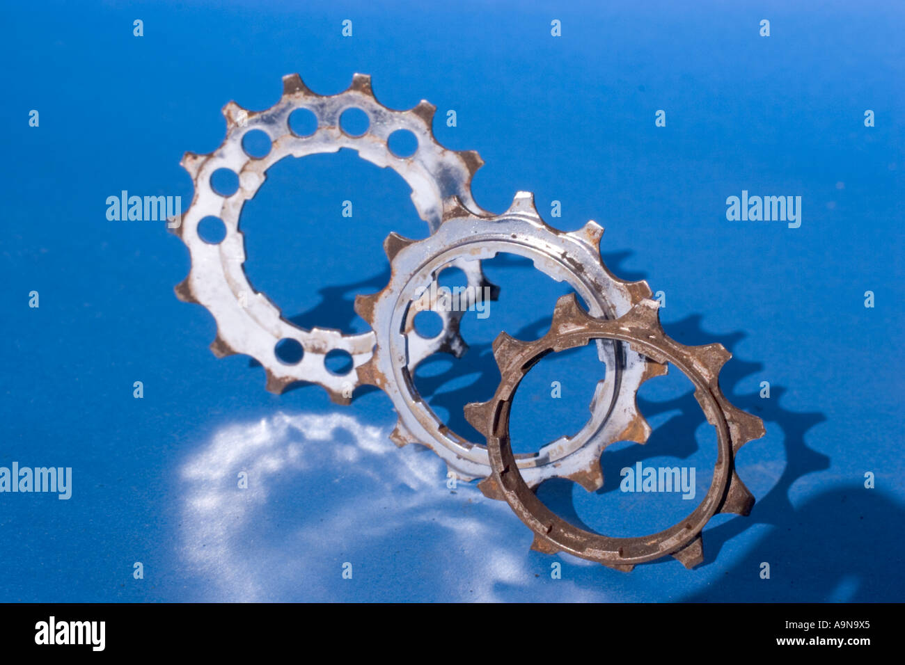 Cogs Gears rusty used and worn cogs from bicycle gear set Stock Photo ...
