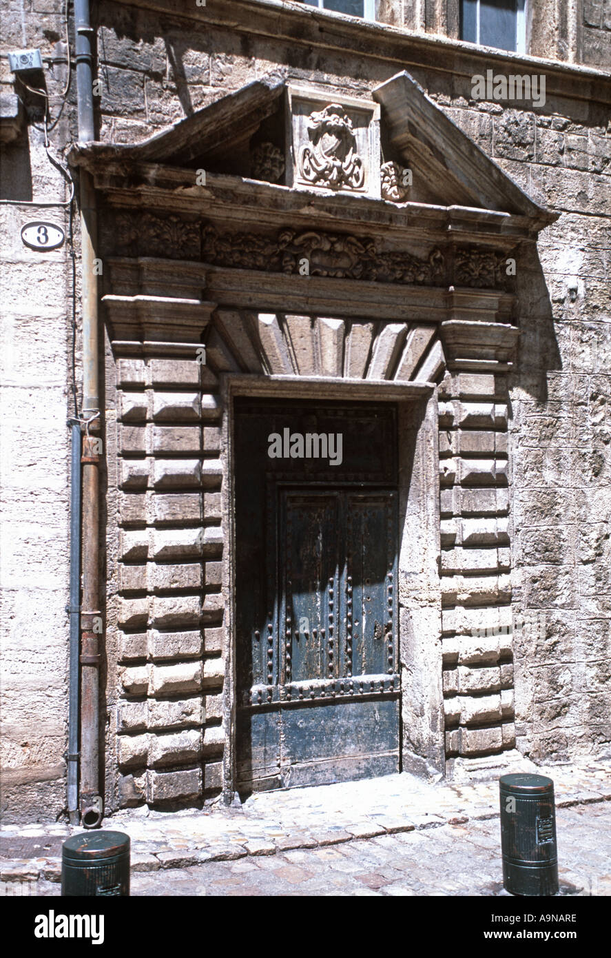 Renaissance doorway with triangular pediment at Pézenas Stock Photo - Alamy