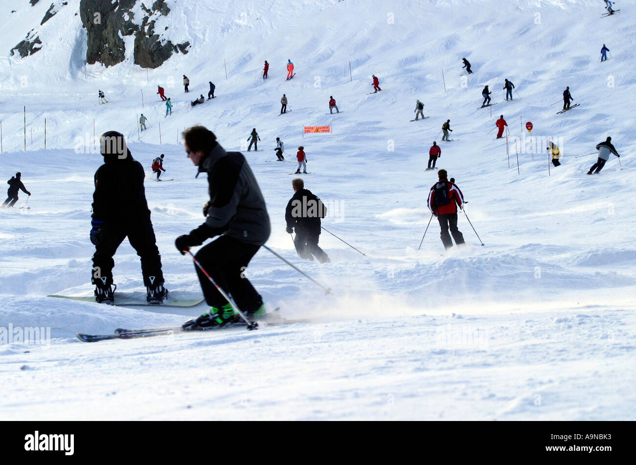 Skiers on busy slope hi-res stock photography and images - Alamy