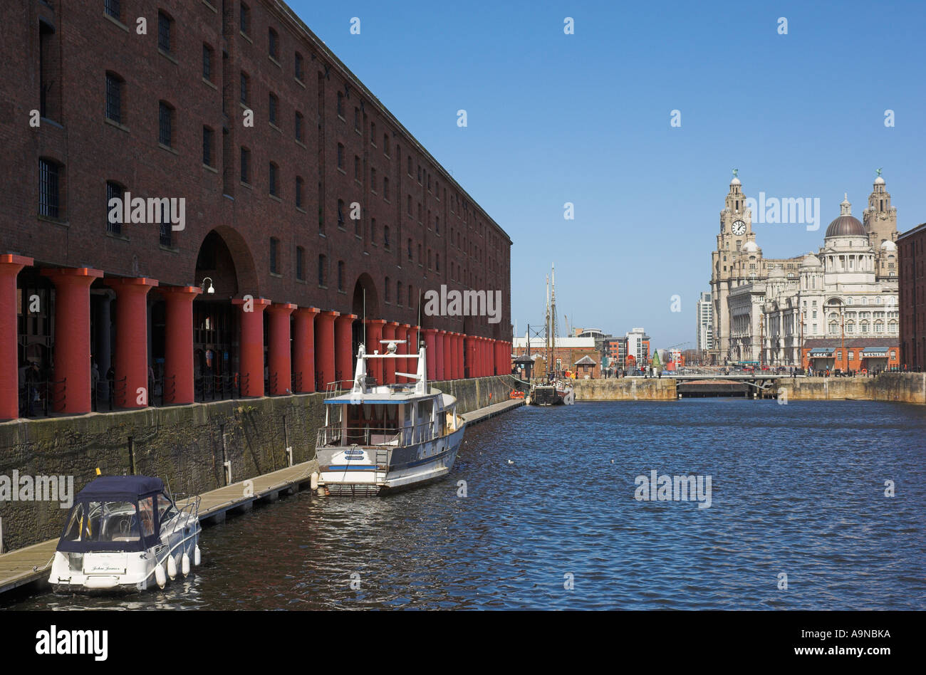 Albert dock red pillars and boats Liverpool merseyside England UK GB EU ...