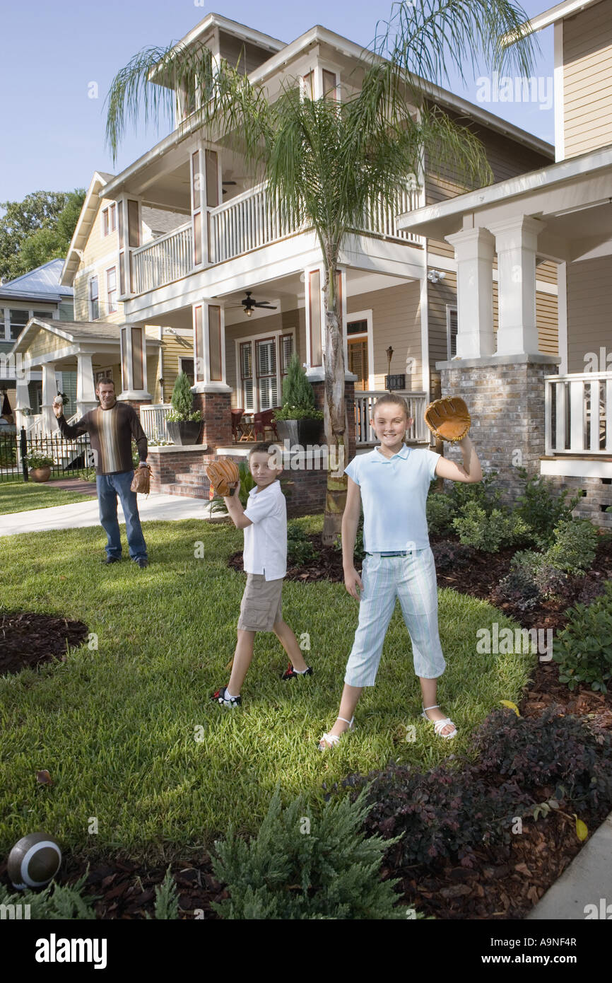 Two kids playing catch baseball hi-res stock photography and images - Alamy