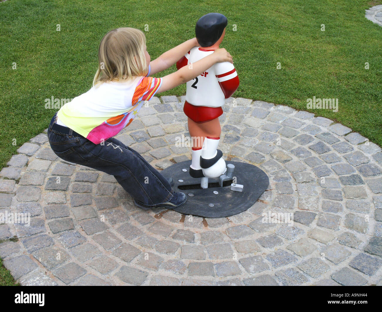 Human figure soccer player in park in Munich Germany Stock Photo - Alamy