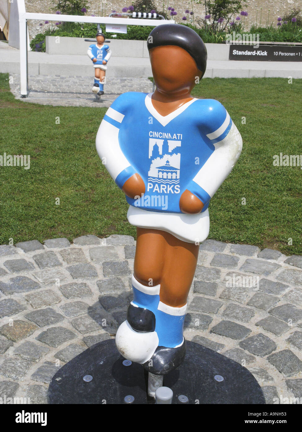 Human figure soccer player in park in Munich Germany Stock Photo - Alamy