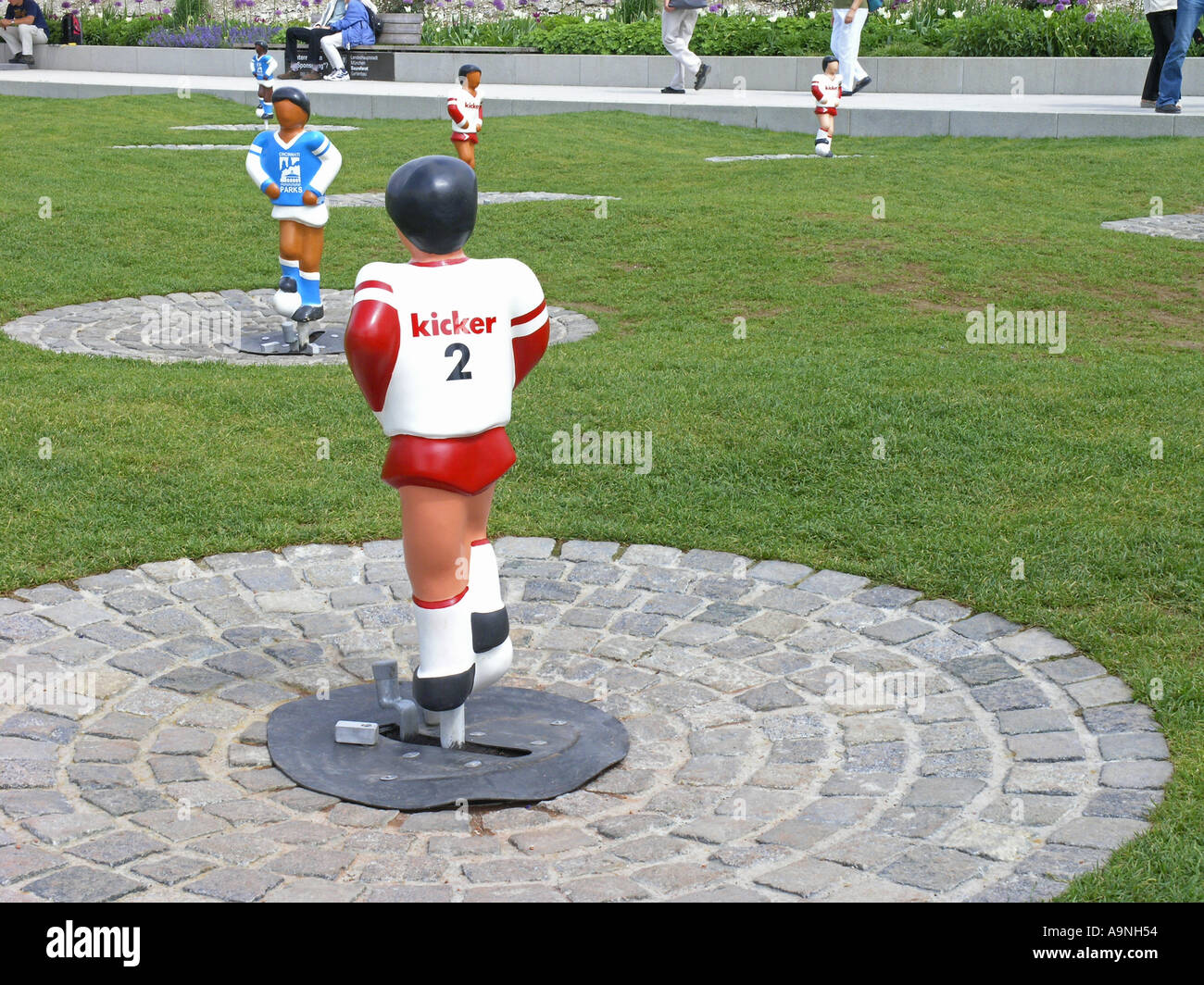 Human figure soccer player in park in Munich Germany Stock Photo - Alamy