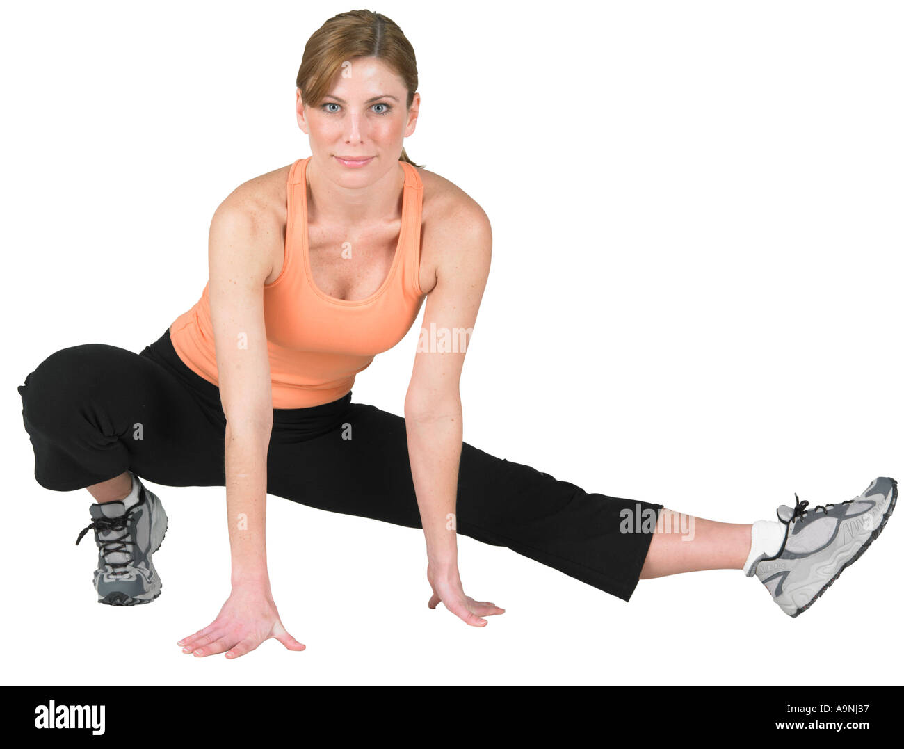 Young woman exercising Stock Photo - Alamy