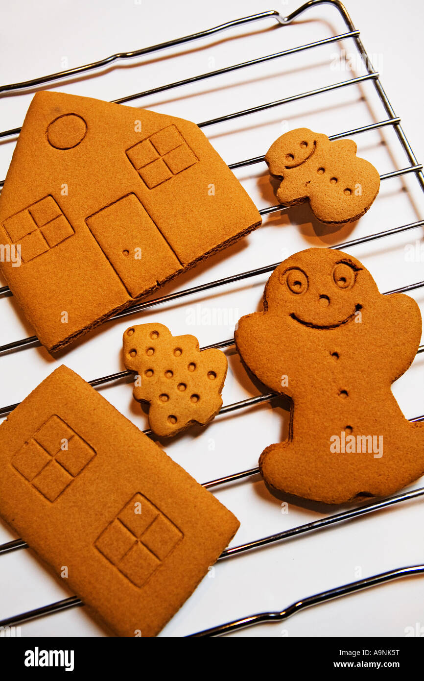 Image of several parts to a gingerbread house fresh out of the oven and ...