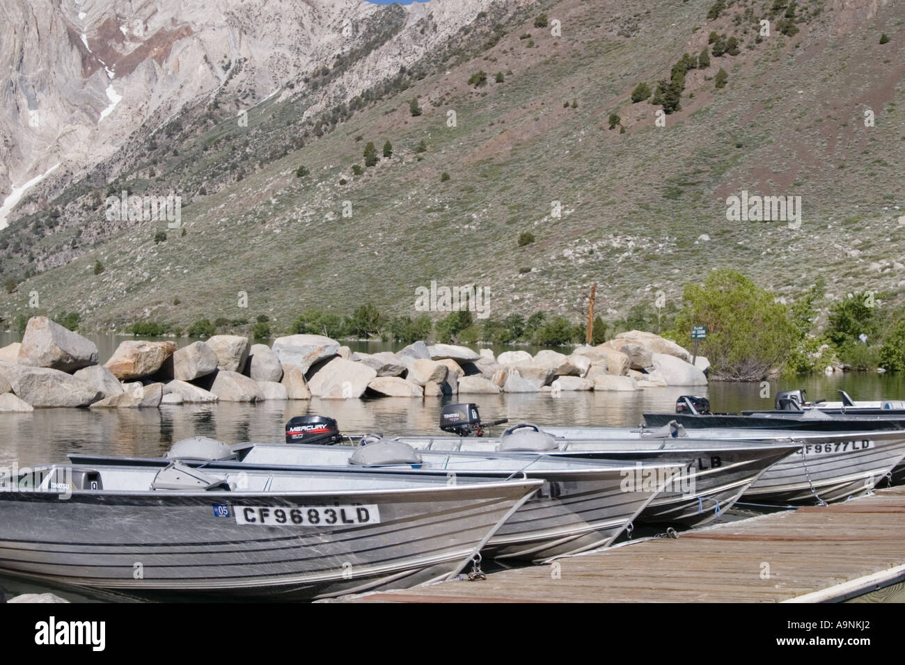 Aluminum motor boats docked at the Convict Lake marina Inyo National ...