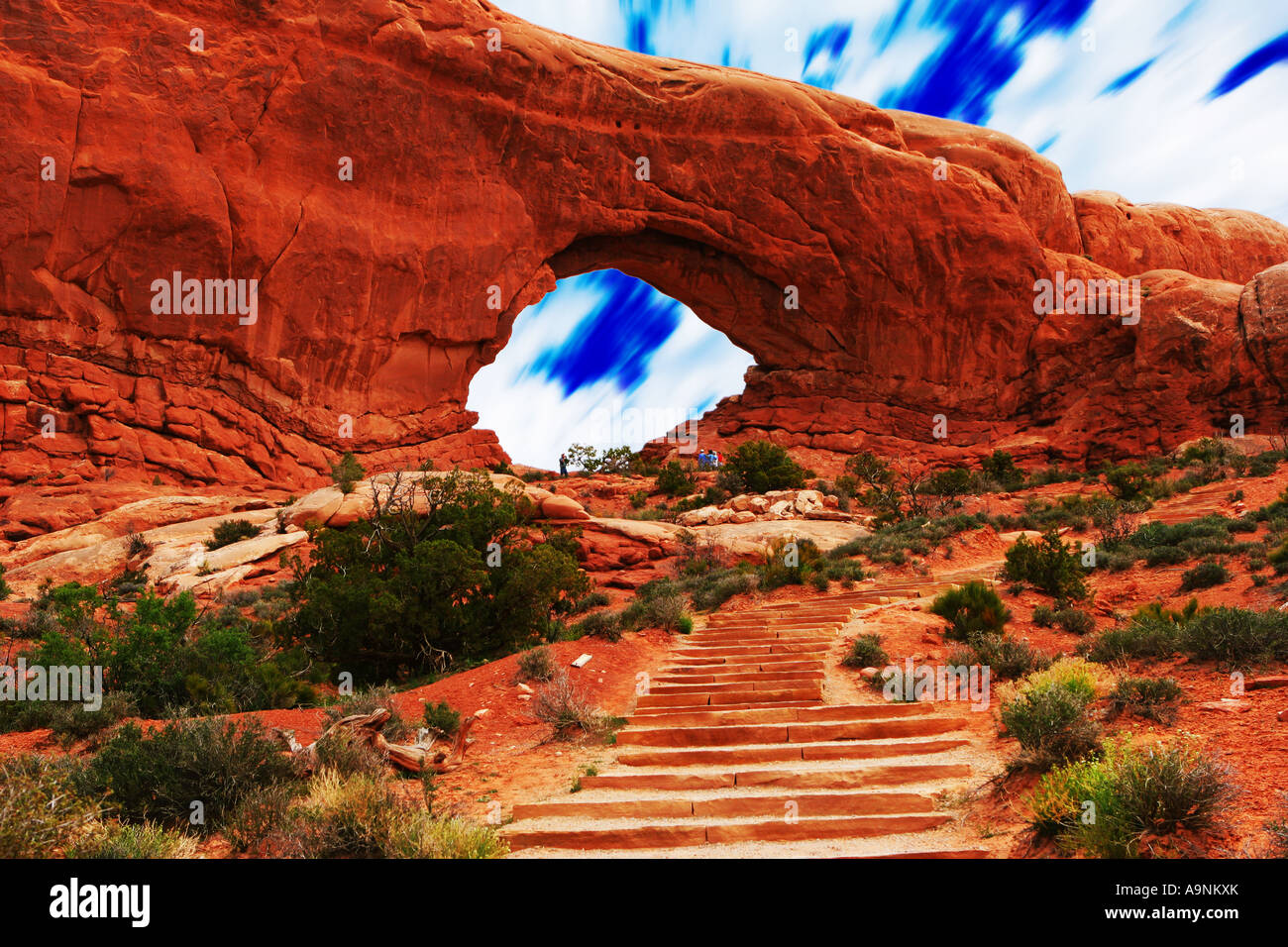 Image of a staircase trail leading up and through an open window arch ...