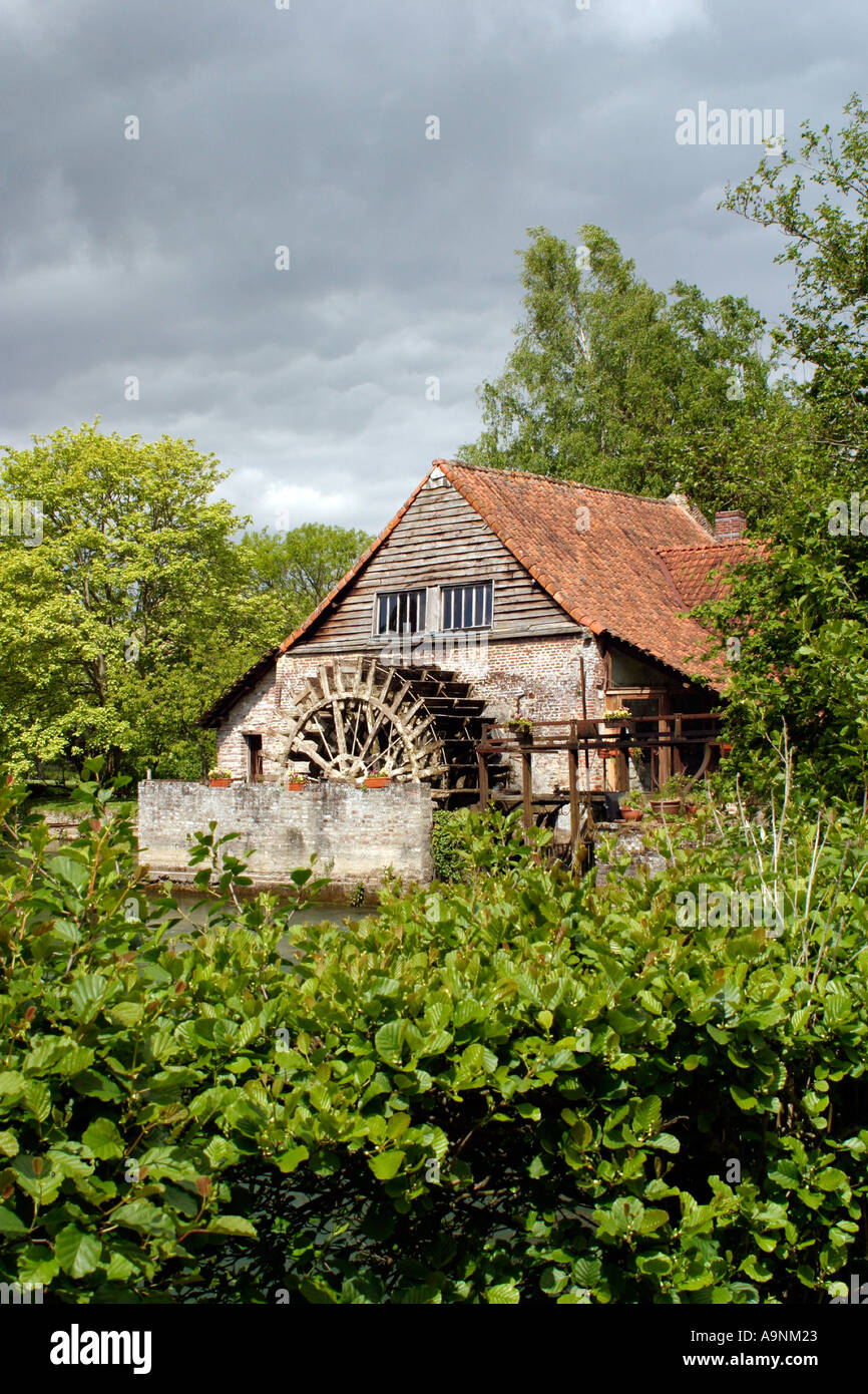 Waterwheel at Moulin de Maintenay with overcast sky Stock Photo - Alamy