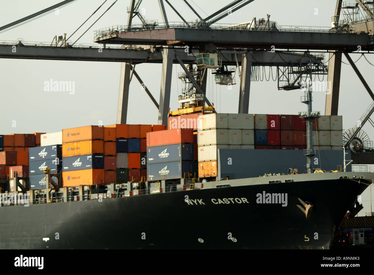 Straddle carrier lifting container hi-res stock photography and images ...