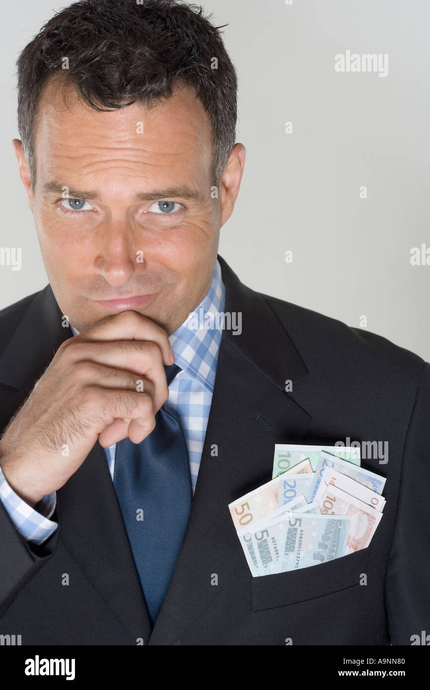 Rich man euros hi-res stock photography and images - Alamy