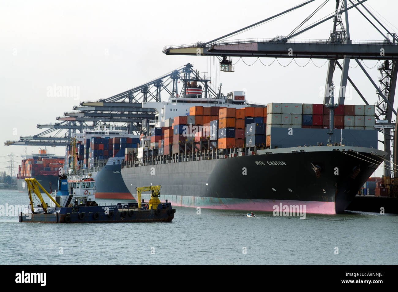 Container ships docked on quayside Port of Southampton southern England ...