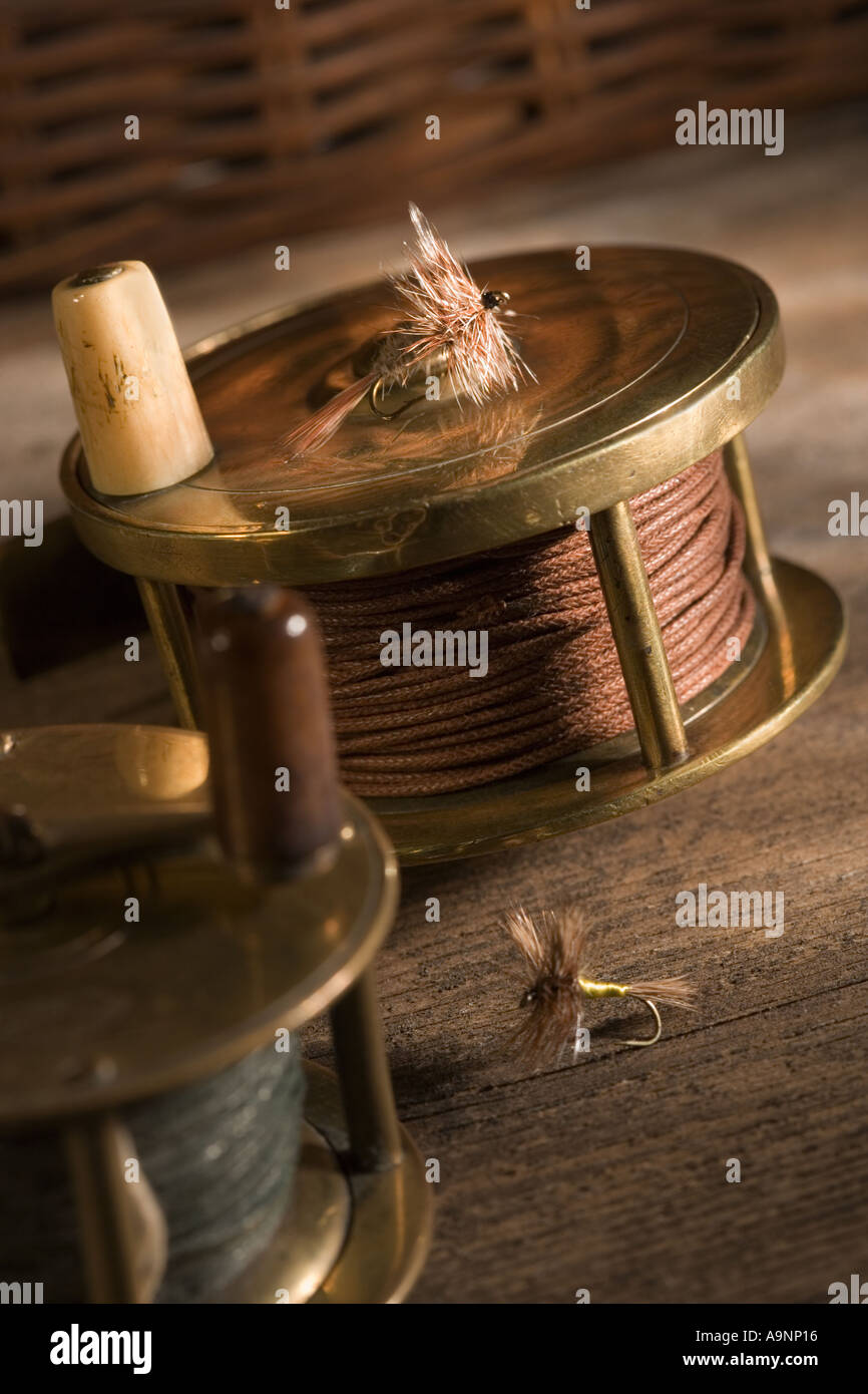 Still life of antique fishing reels Stock Photo - Alamy
