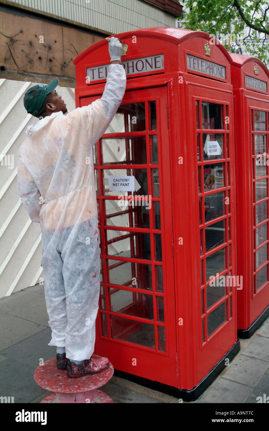 RED BRITISH TELEPHONE BOX CLEANING AND PAINTING BY THE TELECOM CENTRAL ...