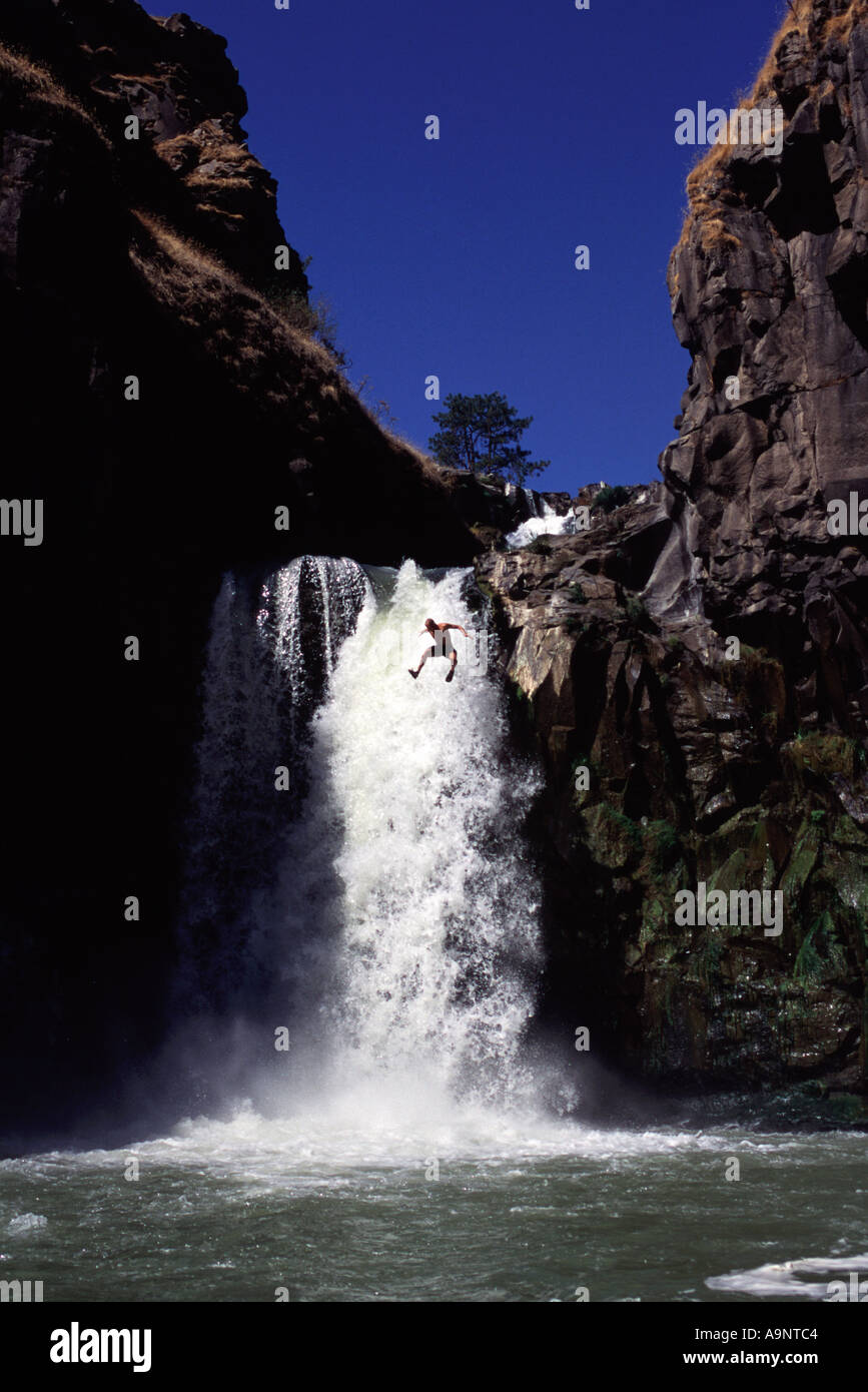 Man jumping on waterfall hi-res stock photography and images - Alamy