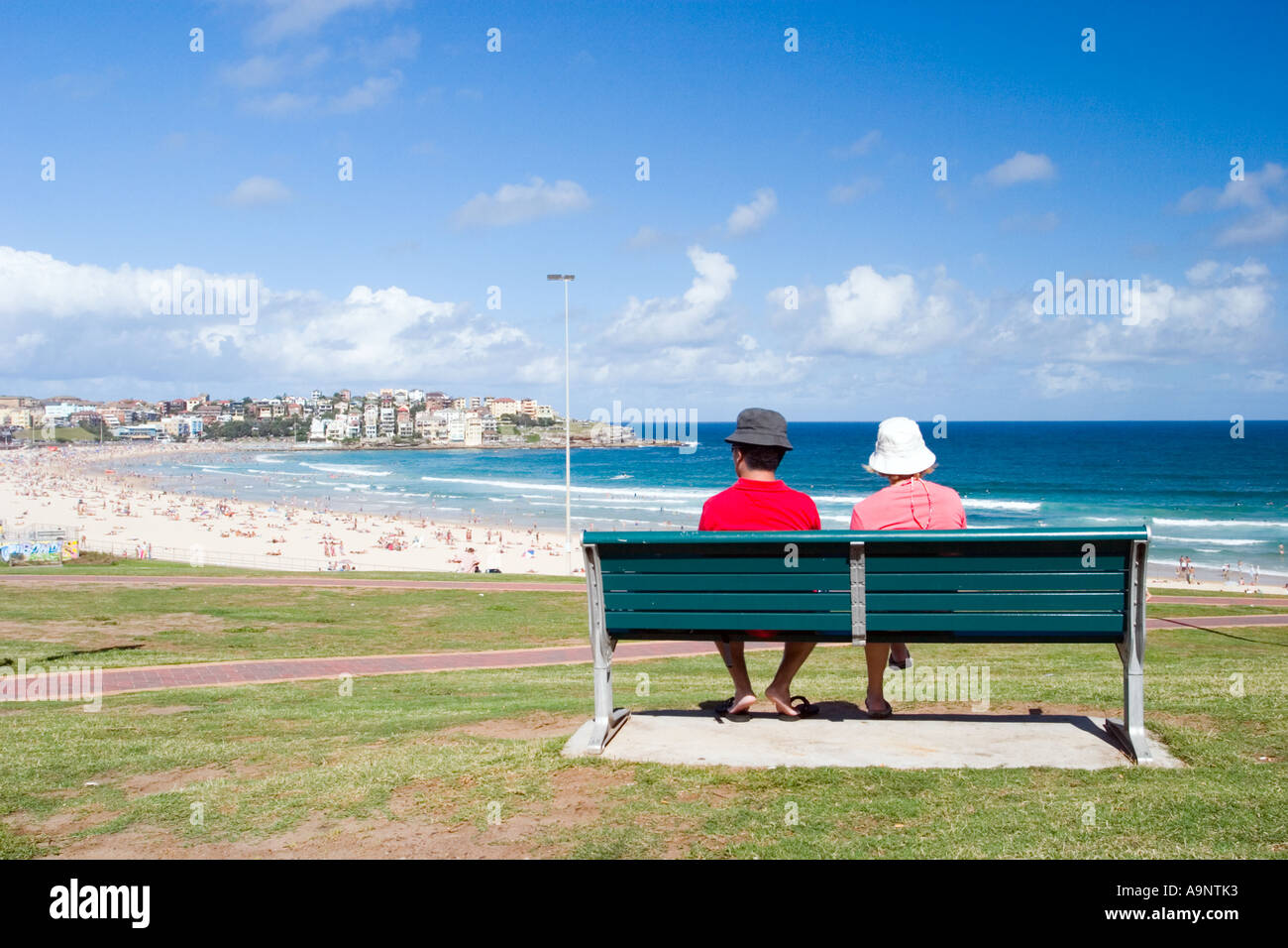 Seated couple overlook Bondi beach Sydney Stock Photo - Alamy