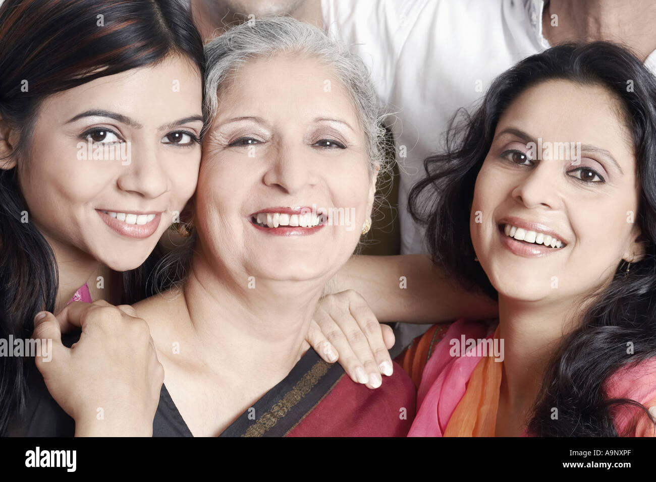 Portrait of three women smiling Stock Photo - Alamy