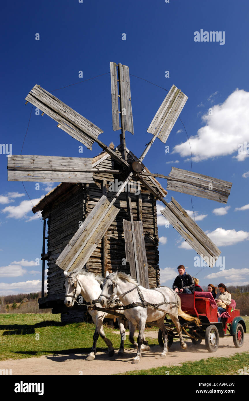 Countryside scenic Rural architecture People in a carriage with horses ...