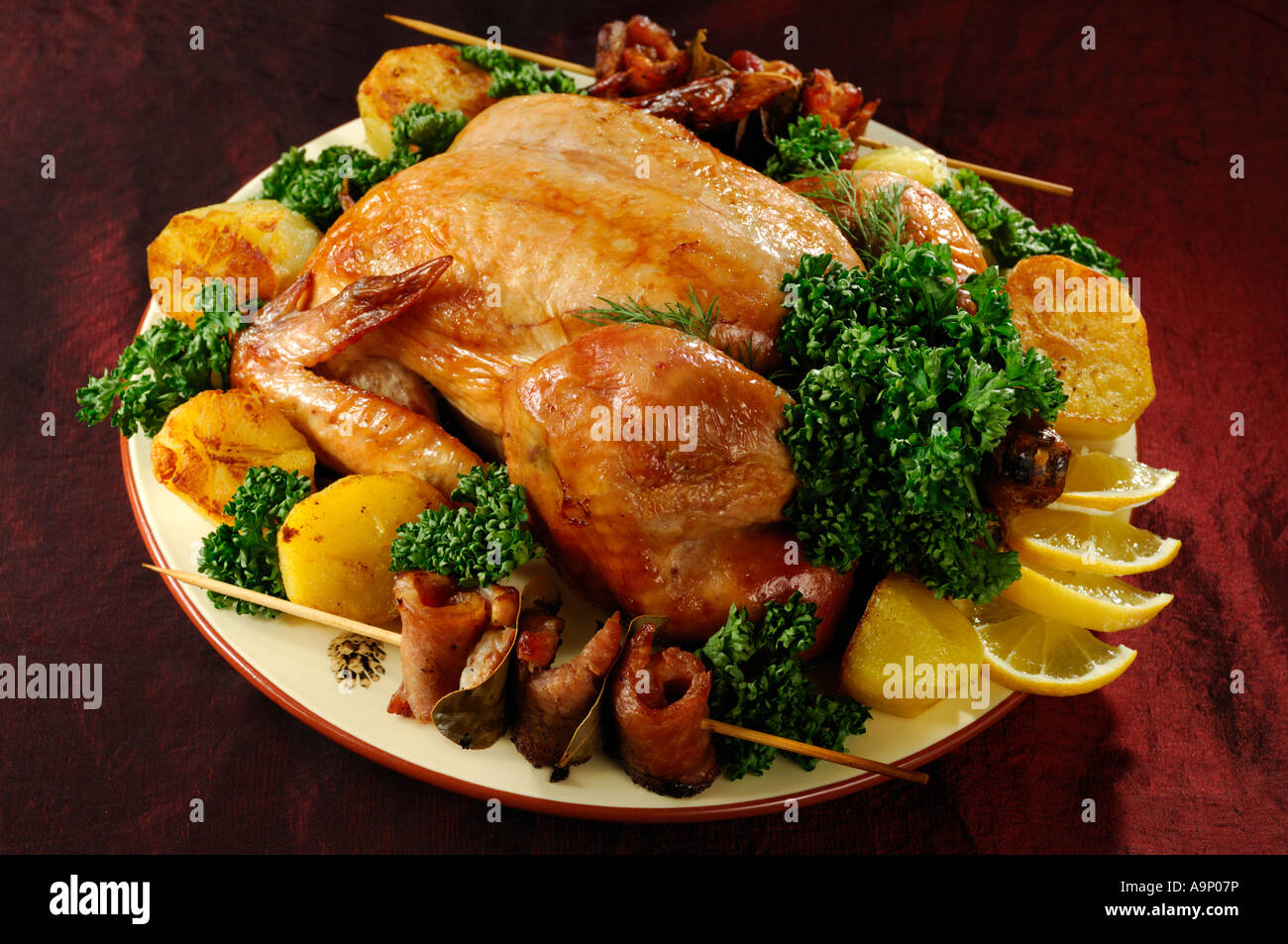 Appetizing roast chicken on a plate Stock Photo - Alamy
