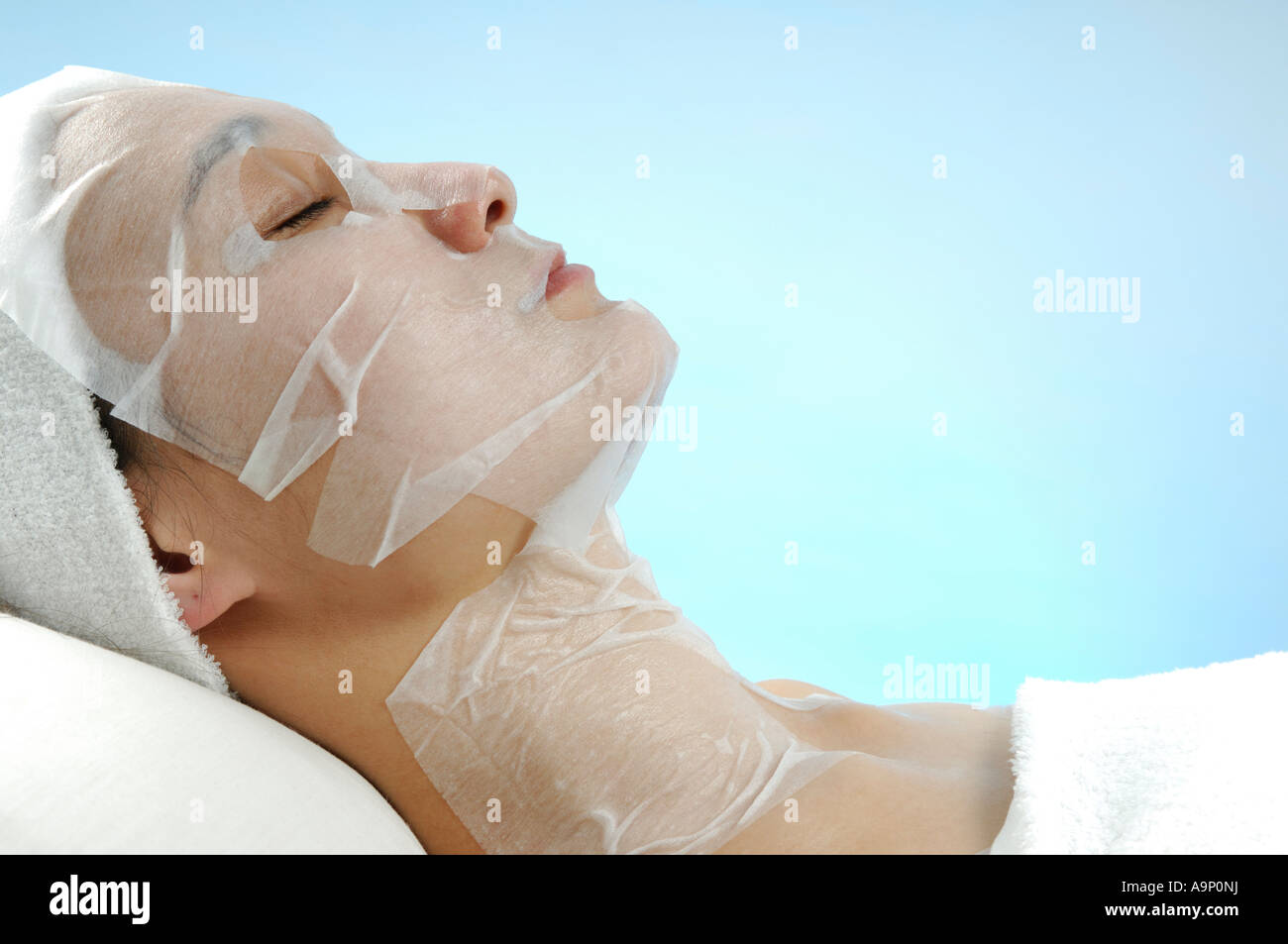 Woman relaxing with a facial mask Relaxation spa beauty treatment ...