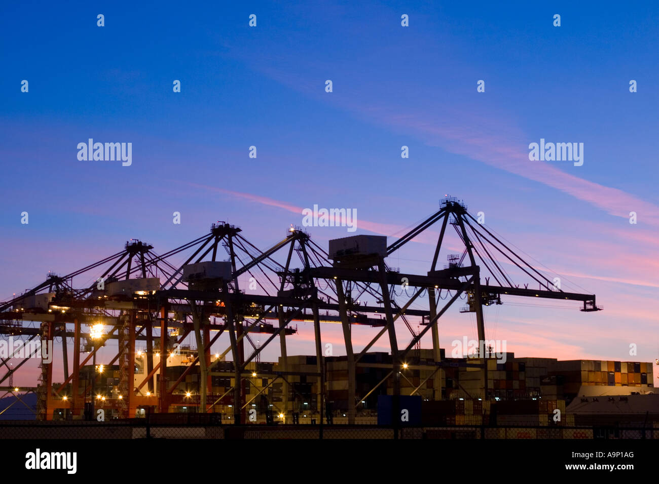 The heavy industrial machines of a port for World Trade and Commerce ...