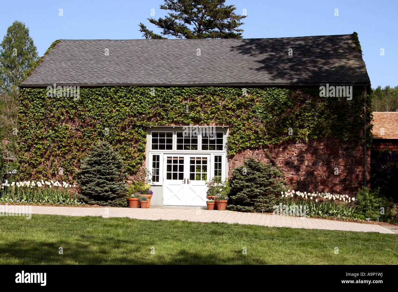 An old barn restored and quaint Stock Photo - Alamy