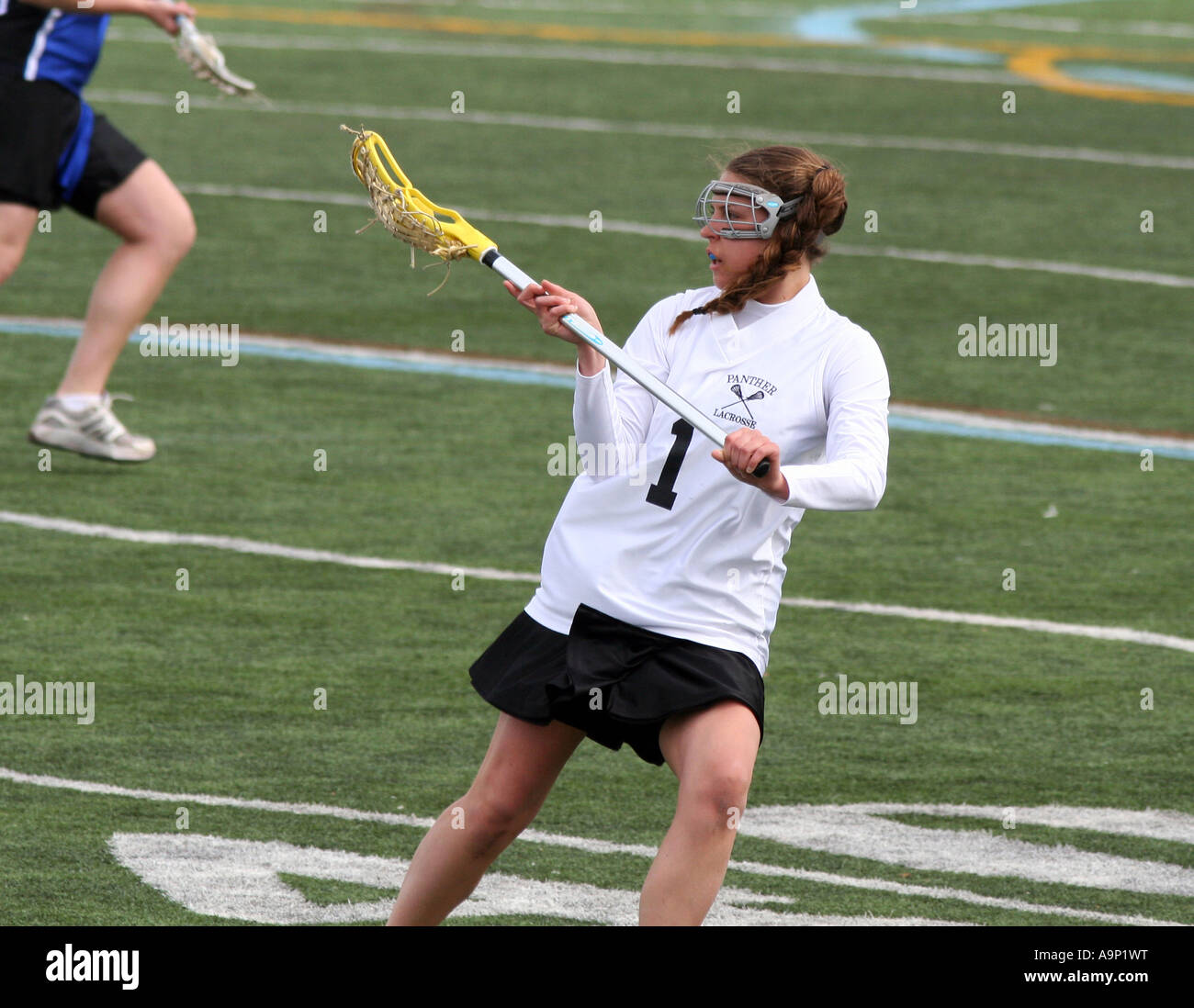 Catching the lacrosse ball Stock Photo - Alamy