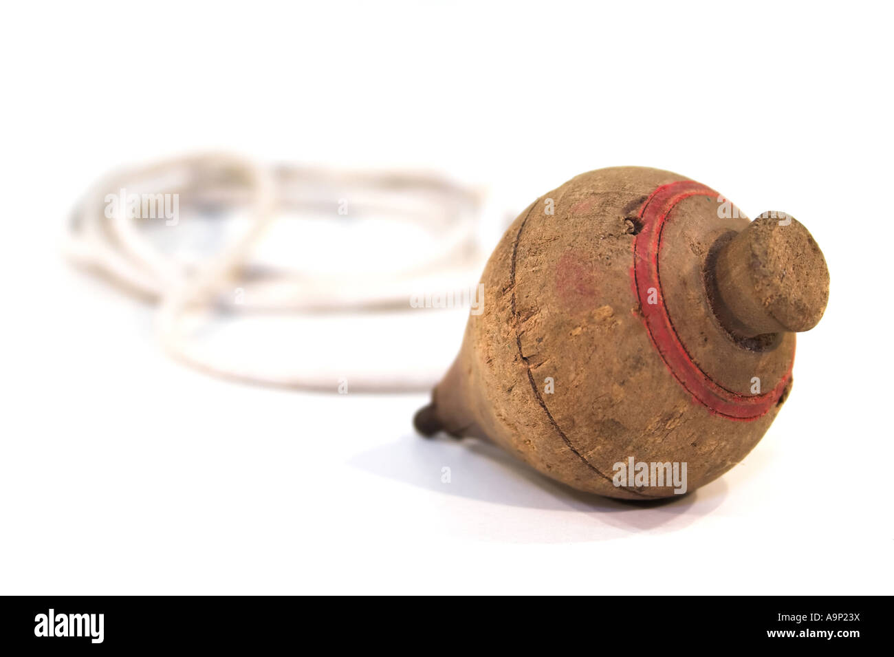 Wooden spinning top Cut Out Stock Images & Pictures - Alamy