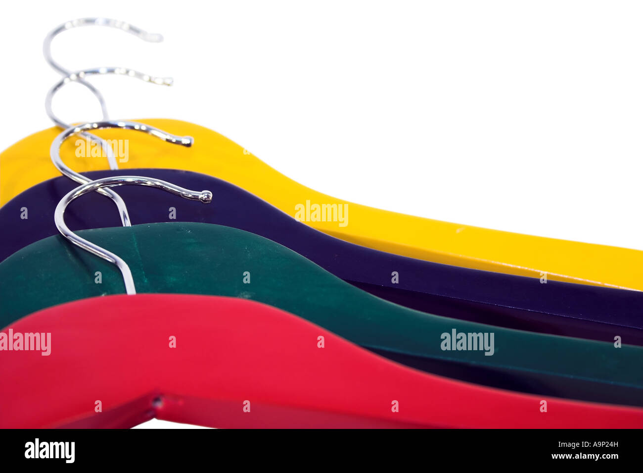 Colorful set of clothes-hangers isolated on white Stock Photo - Alamy