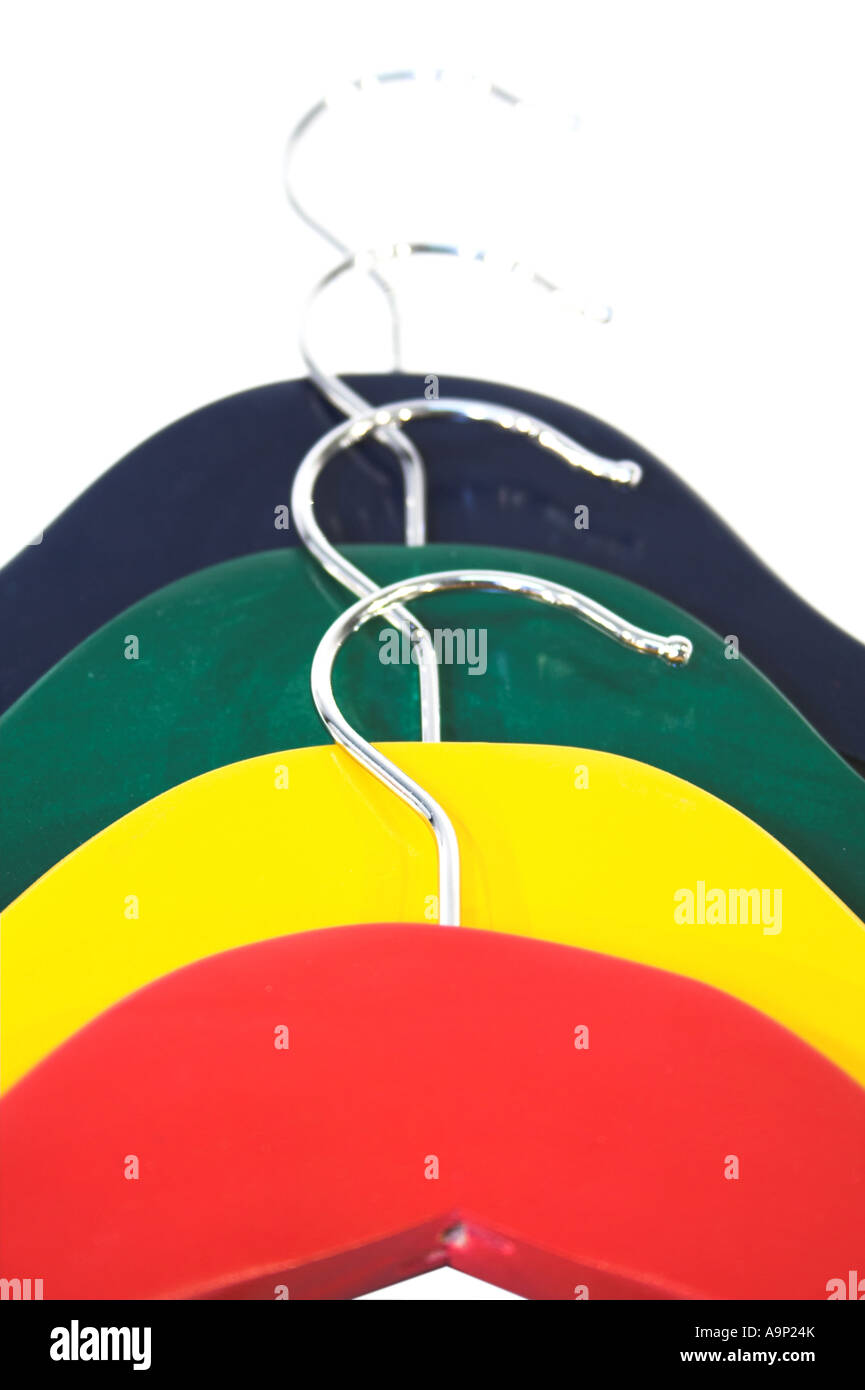 Colorful clothes hangers isolated on white Stock Photo - Alamy