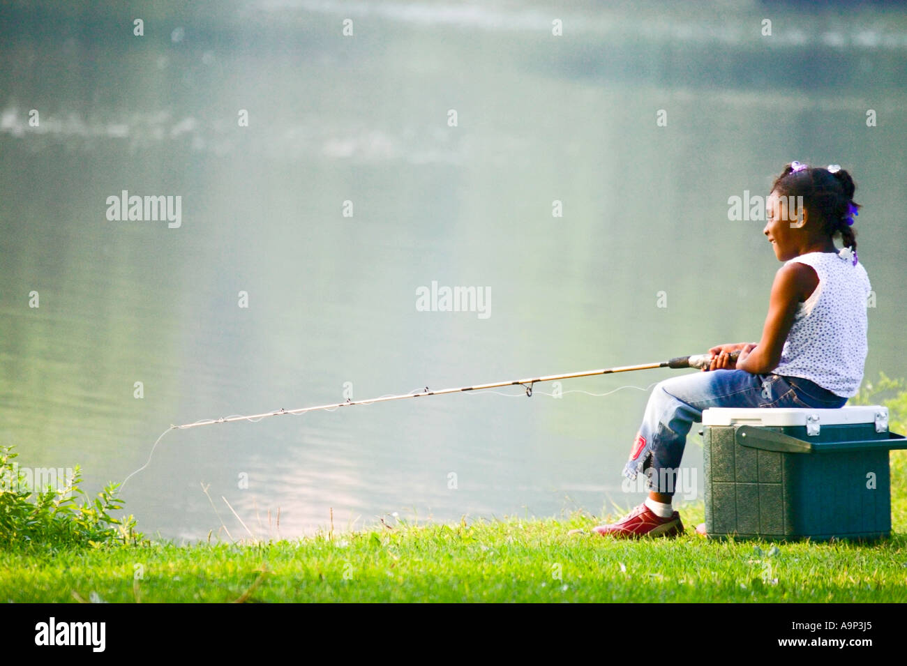 American girl fishing hi-res stock photography and images - Alamy