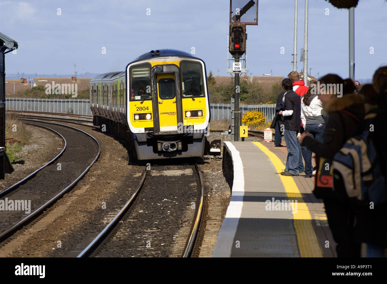 A train arriving at a suburban station in north county Dublin Ireland ...
