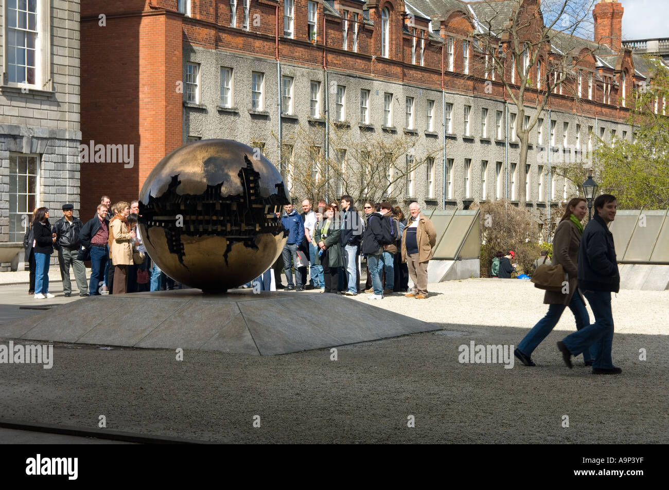 A group of tourists outside the Berkeley Library in Trinity College ...