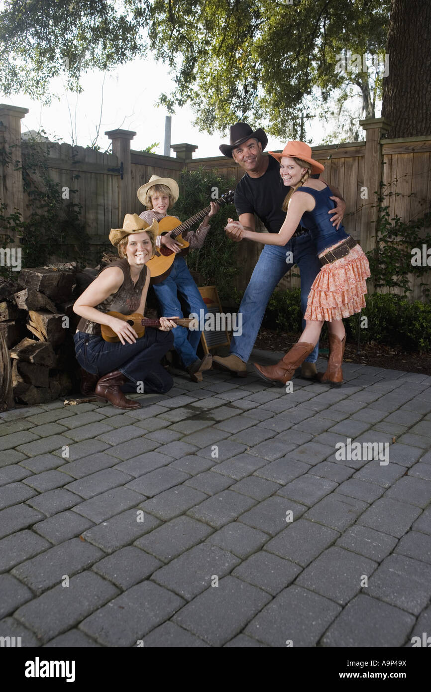 Family playing country music and dancing together Stock Photo - Alamy